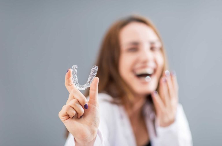 Can I Chew Gum with Invisalign? Do’s & Don’ts | St. Albert